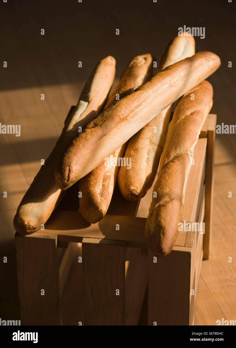 Close-up of loaves of bread on a crate Stock Photo - Alamy