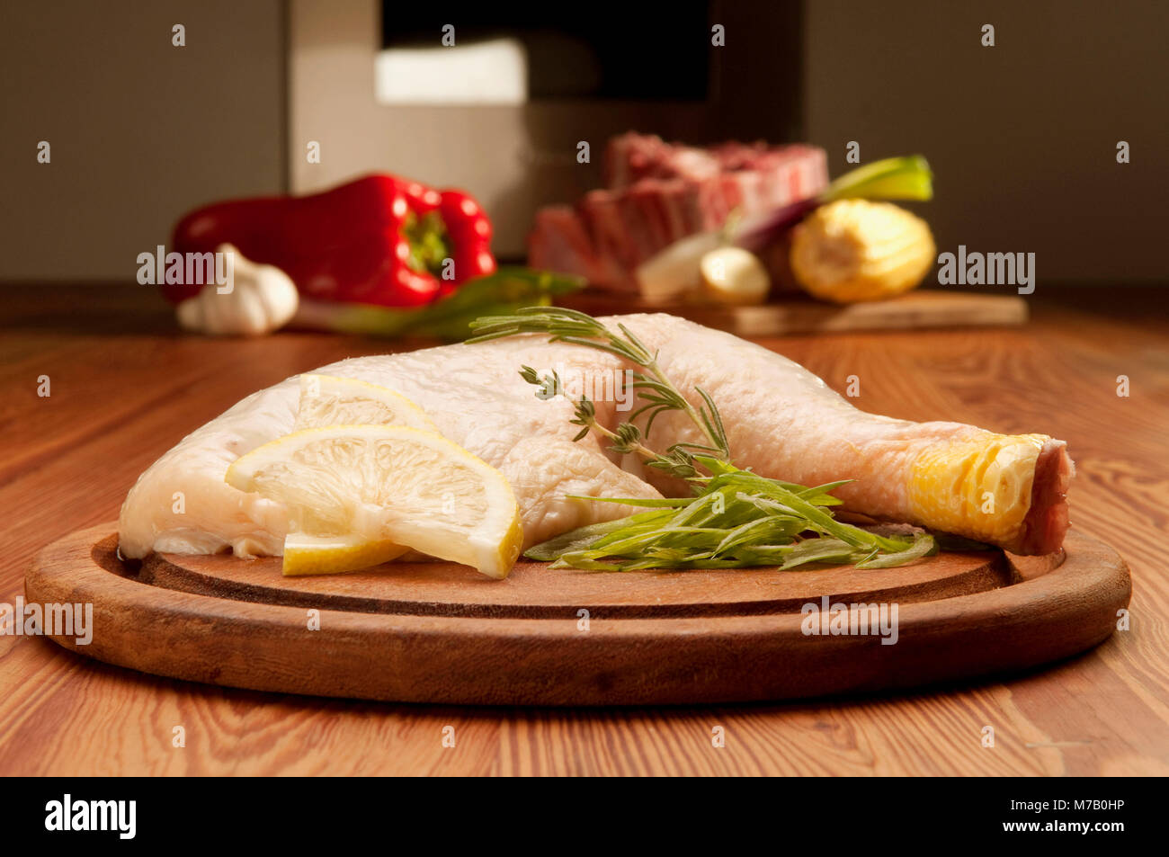 Close-up of an uncooked turkey on a chopping board Stock Photo - Alamy