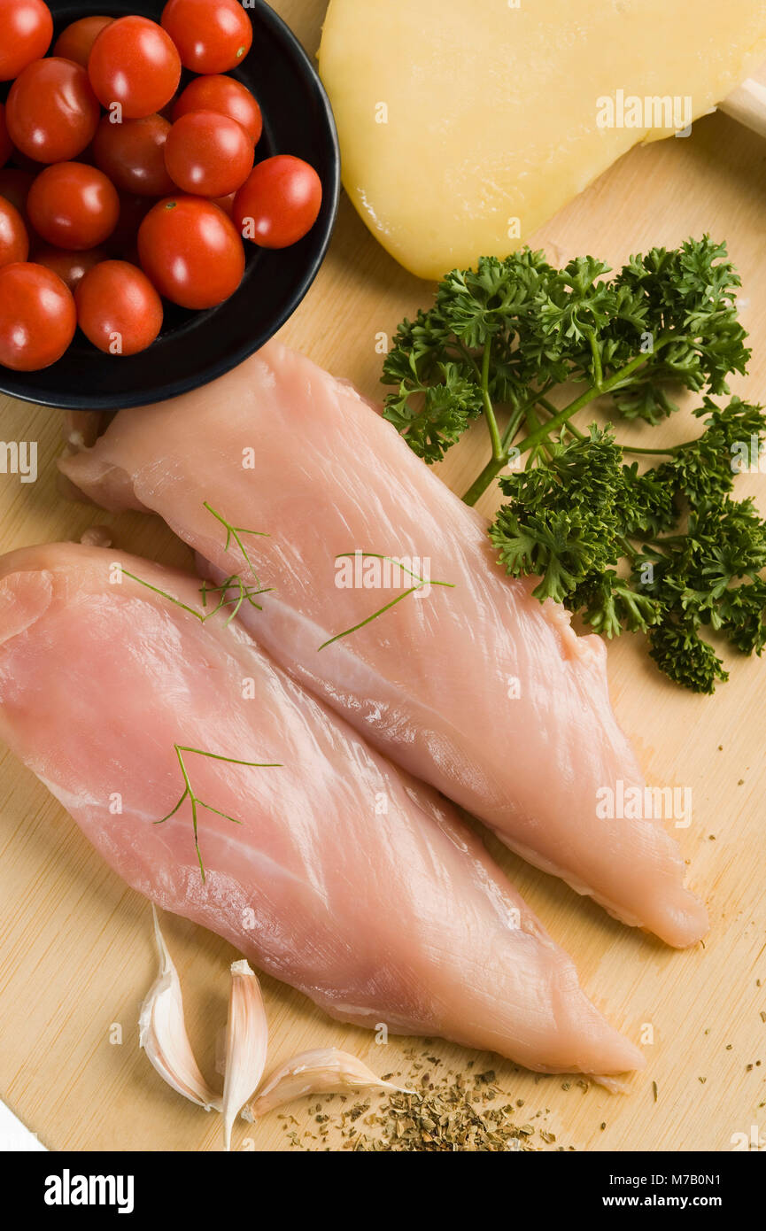 Close-up of raw chicken with ingredients Stock Photo - Alamy