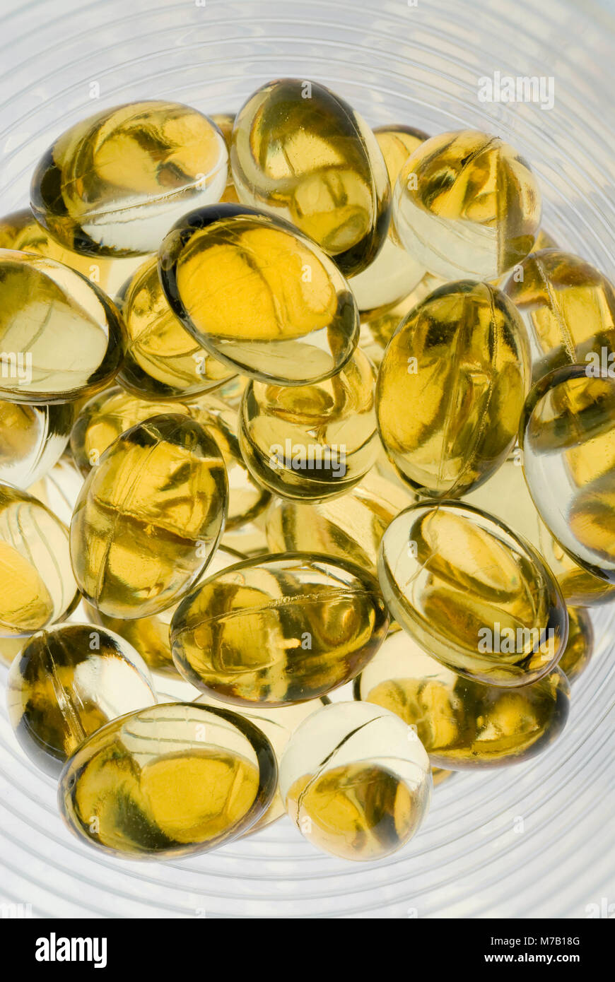 Golden Capsules Stock Photos & Golden Capsules Stock Images - Alamy