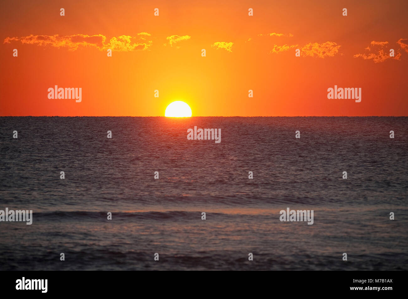 Amber sunset over water hi-res stock photography and images - Alamy