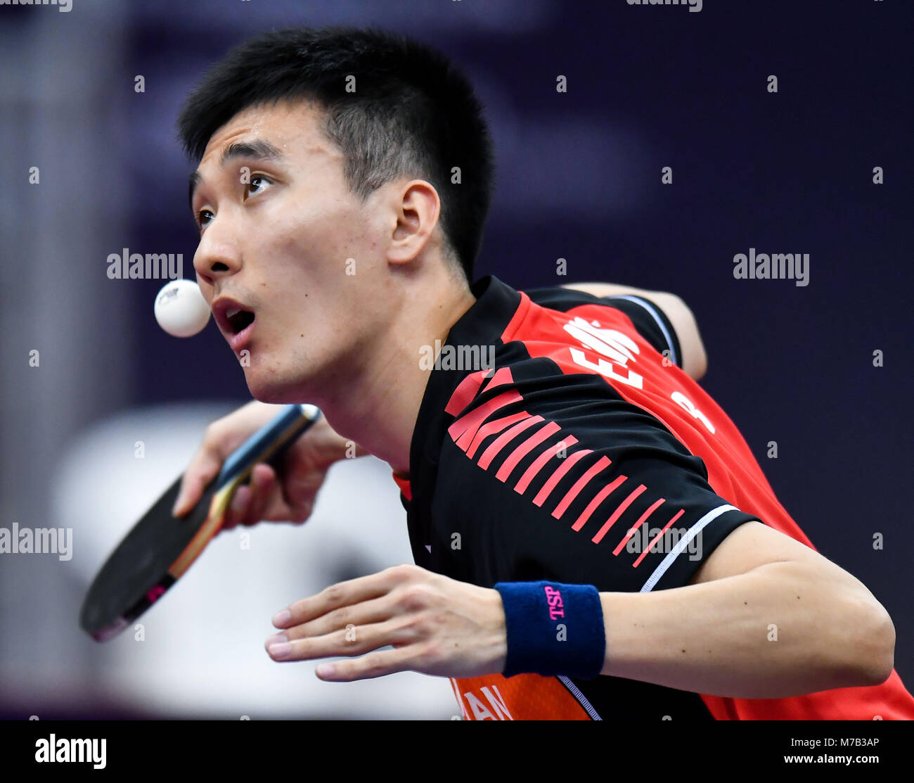 Doha. 9th Mar, 2018. Lee Sangsu of South Korea serves during the men's ...