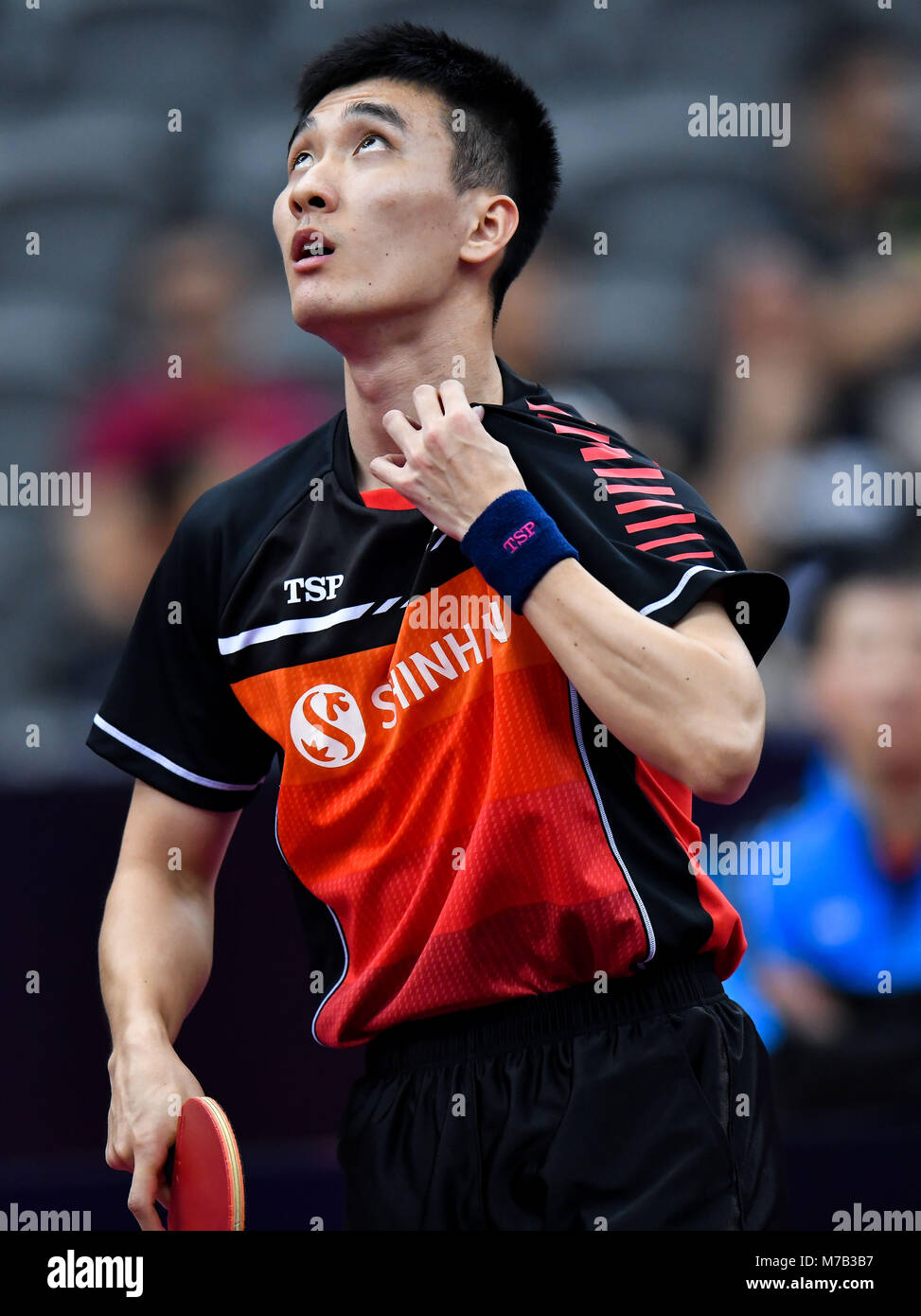 Doha. 9th Mar, 2018. Lee Sangsu of South Korea reacts during the men's singles second round ...