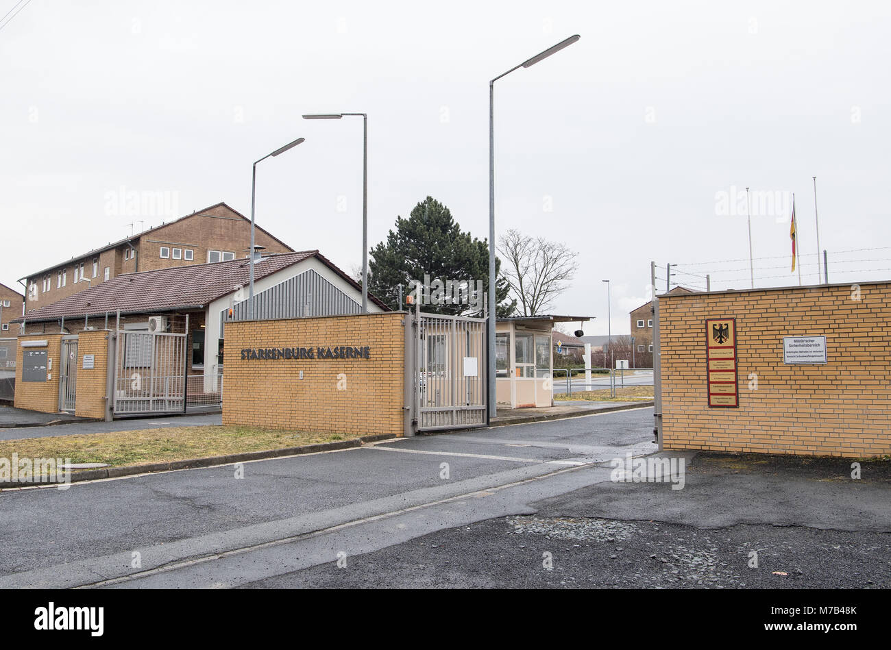09 March 2018, Germany, Darmstadt: The entrance gates of the Bundeswehr ...