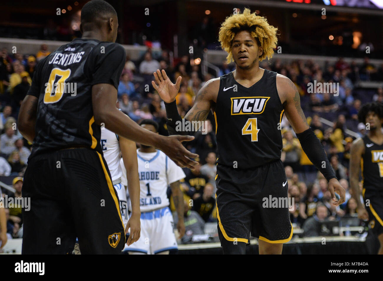Washington, DC, USA. 9th Mar, 2018. JUSTIN TILLMAN (4) high fives DE ...