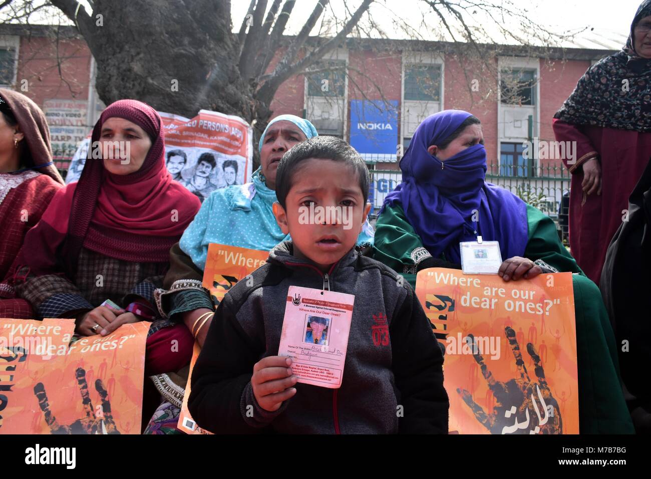 Srinagar, India. 10th Mar, 2018. A Kashmiri boy attends a demonstration ...