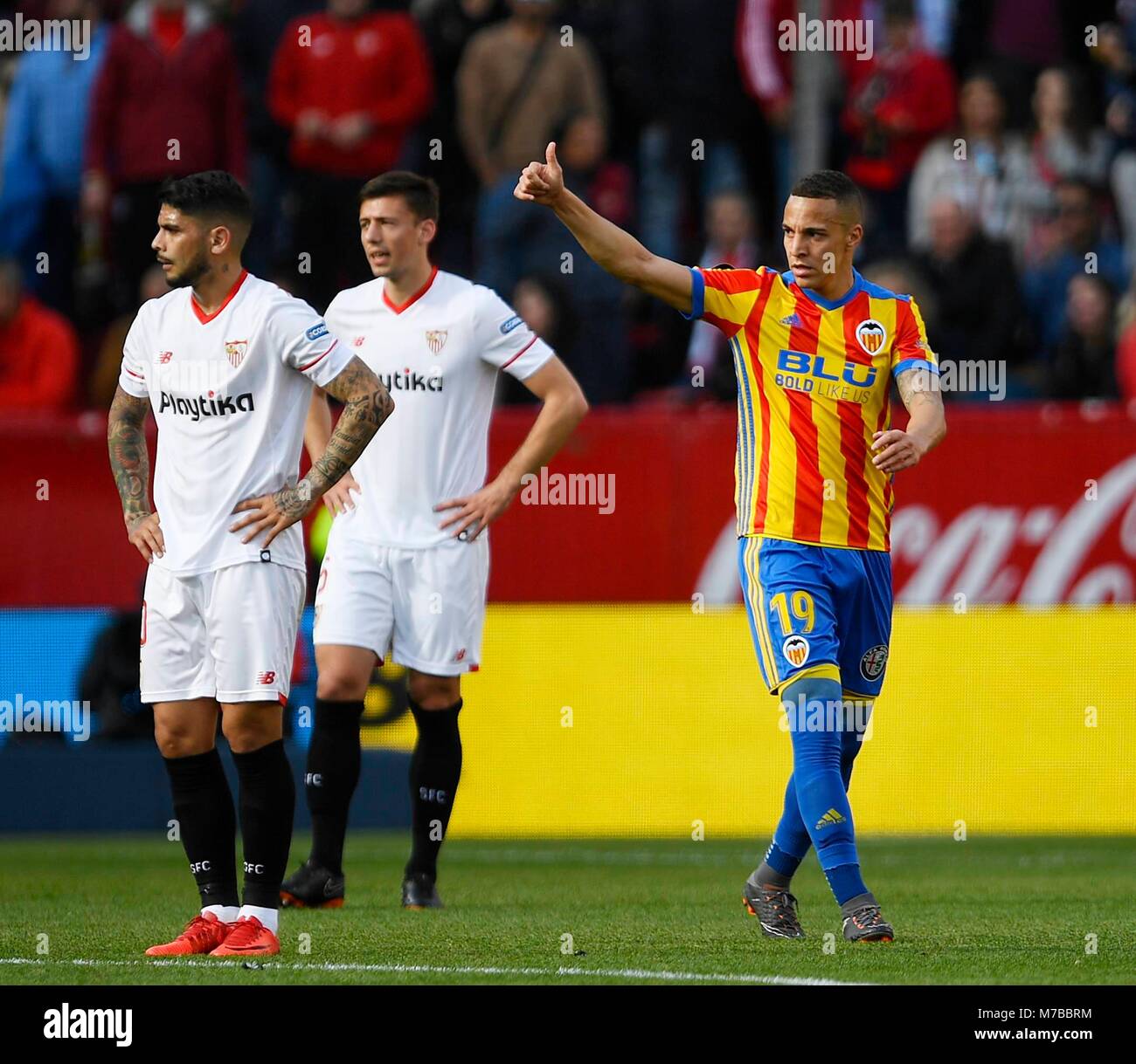 Seville, Spain. 10th Mar, 2018. Rodrigo of Valencia CF celebrates after ...