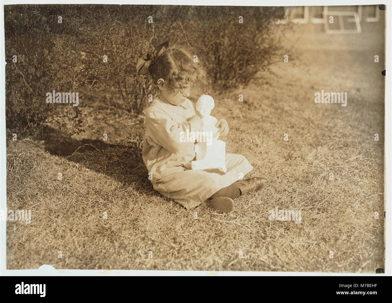 A blind child explores a piece of statuary at the Oklahoma School for ...