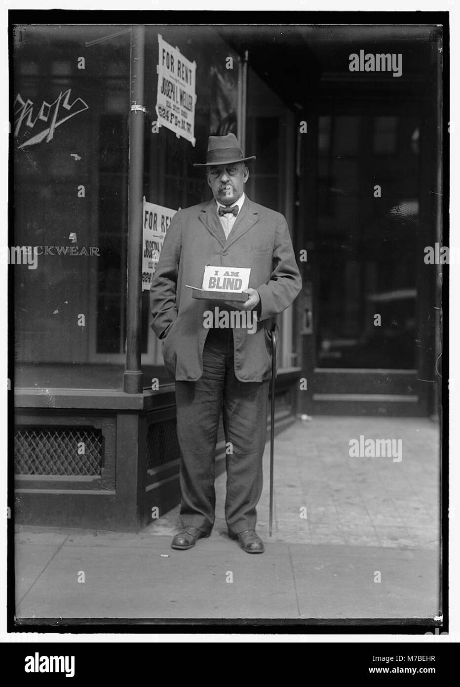 This image portrays a blind man, reflecting the challenges faced by ...
