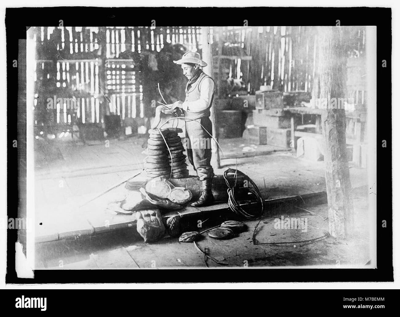 A rubber worker from Bolivia is pictured, showcasing labor in the ...
