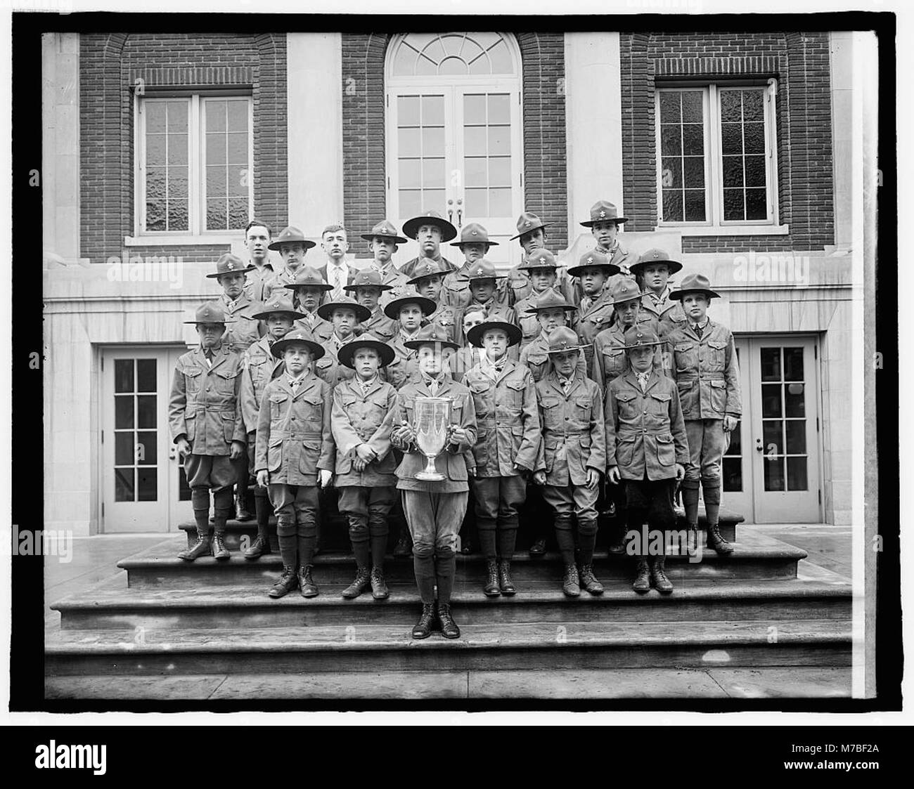 A photograph of Boy Scouts, a group of young individuals engaged in ...