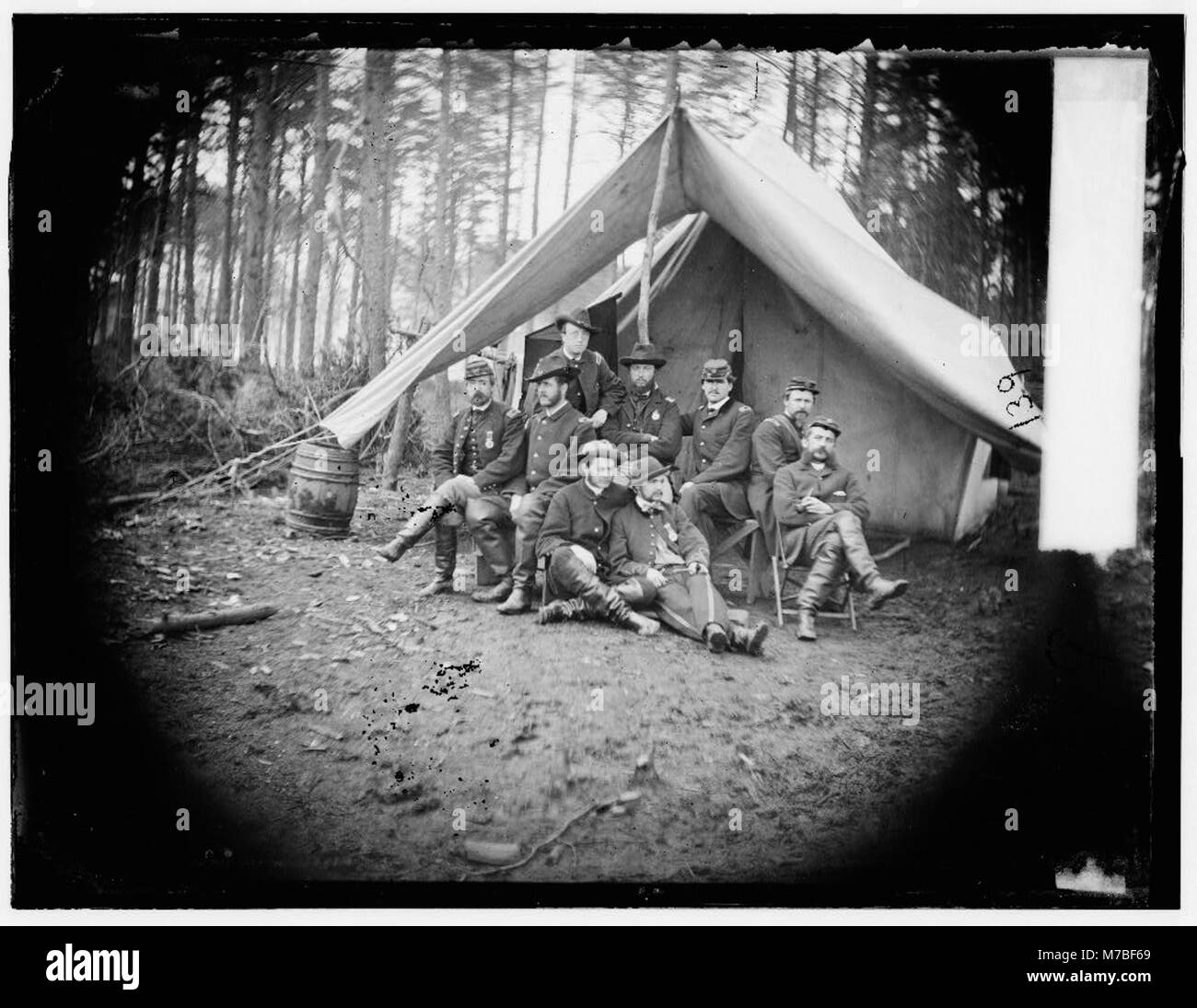 Major William Riddle is pictured with friends at the headquarters of ...