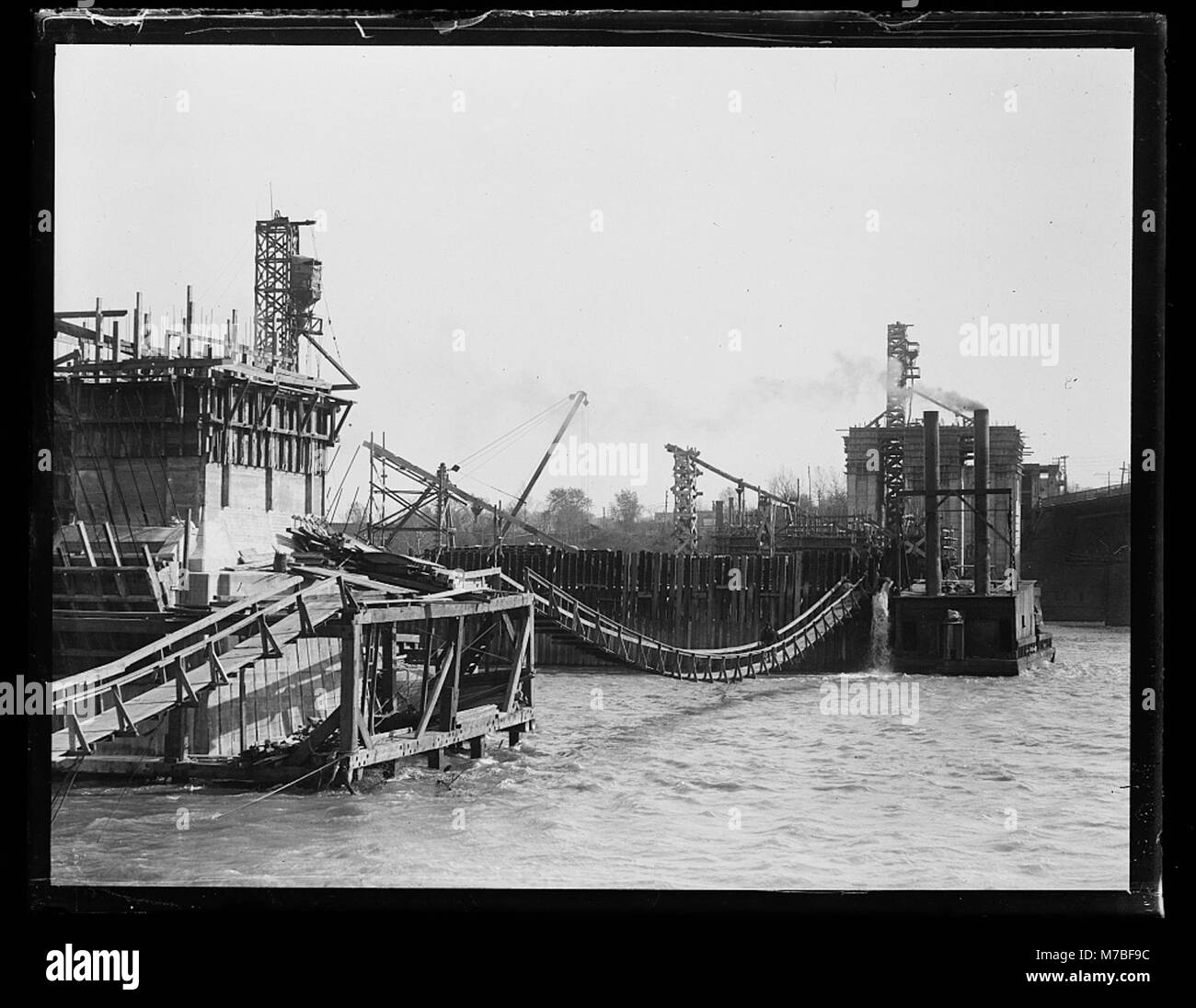 This image shows the process of bridge construction, illustrating the ...
