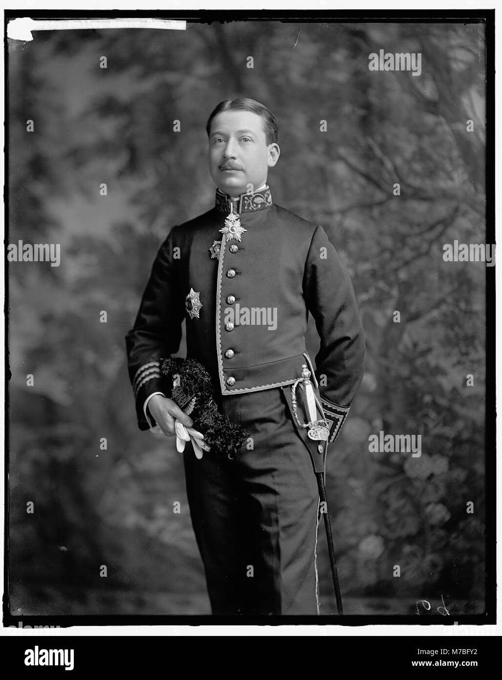 A formal portrait of Don G. Bulle Senor, showcasing his appearance in a ...