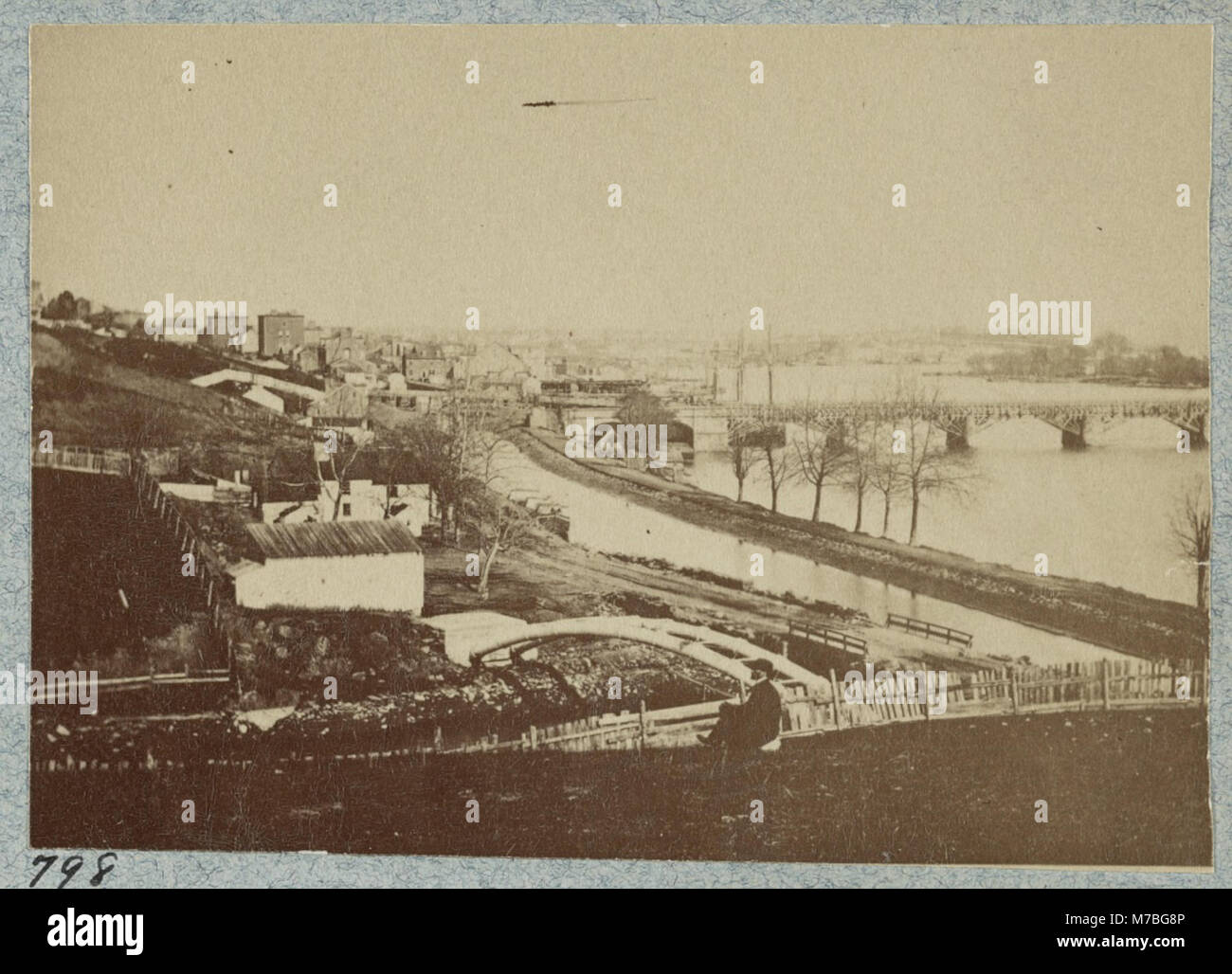 A historical photograph of the canal and aqueduct bridge in Georgetown ...