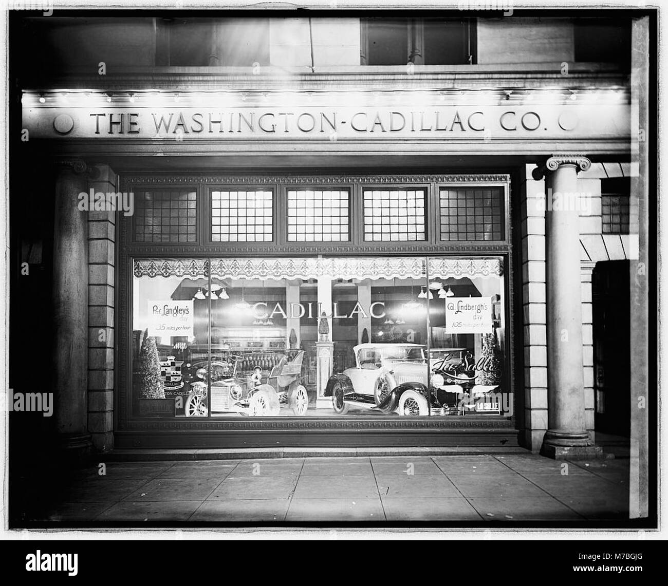 A photograph showing the Cadillac Motor Company window display, likely ...