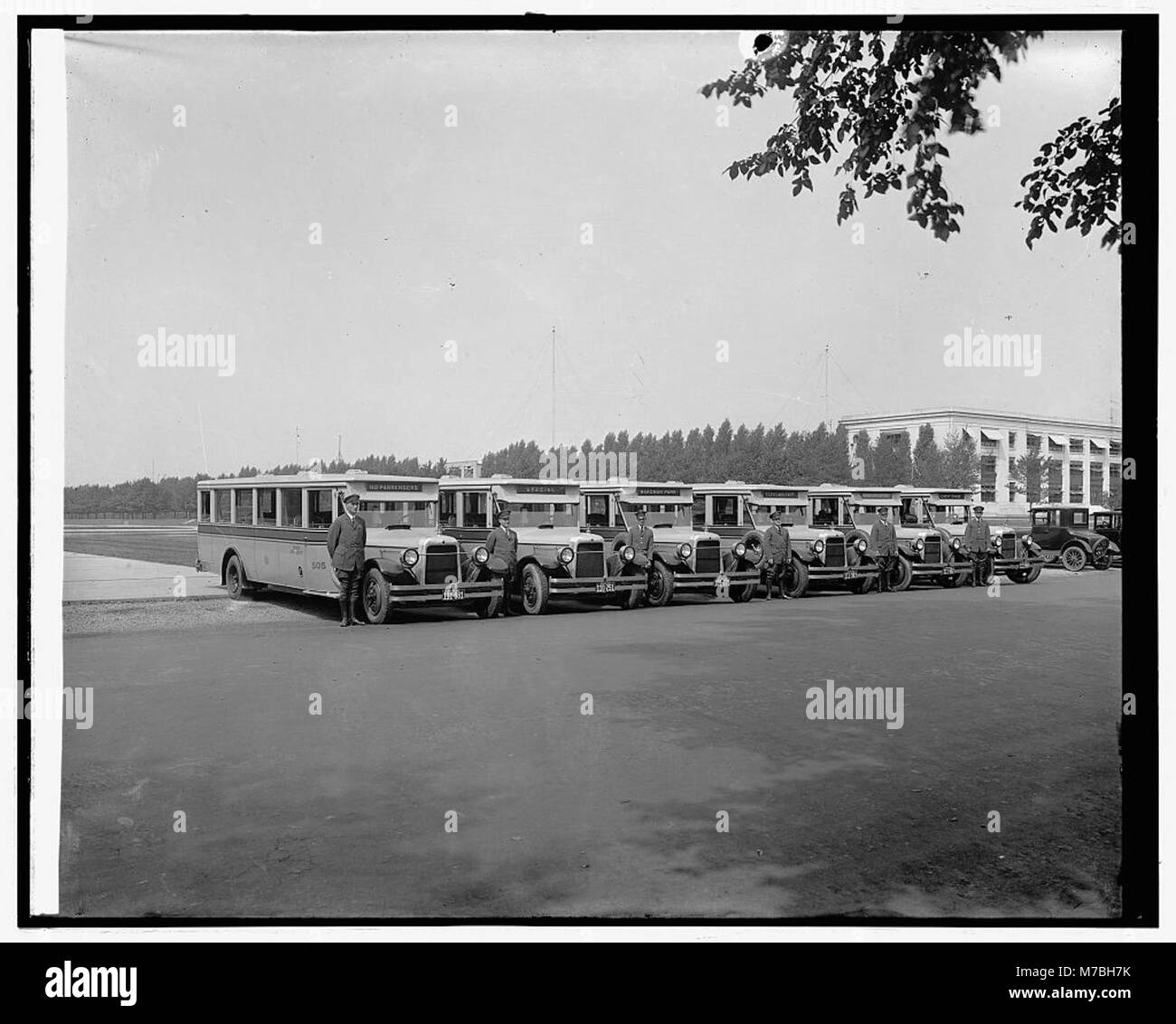 A historical image showing buses from the Capitol Traction Company, a ...