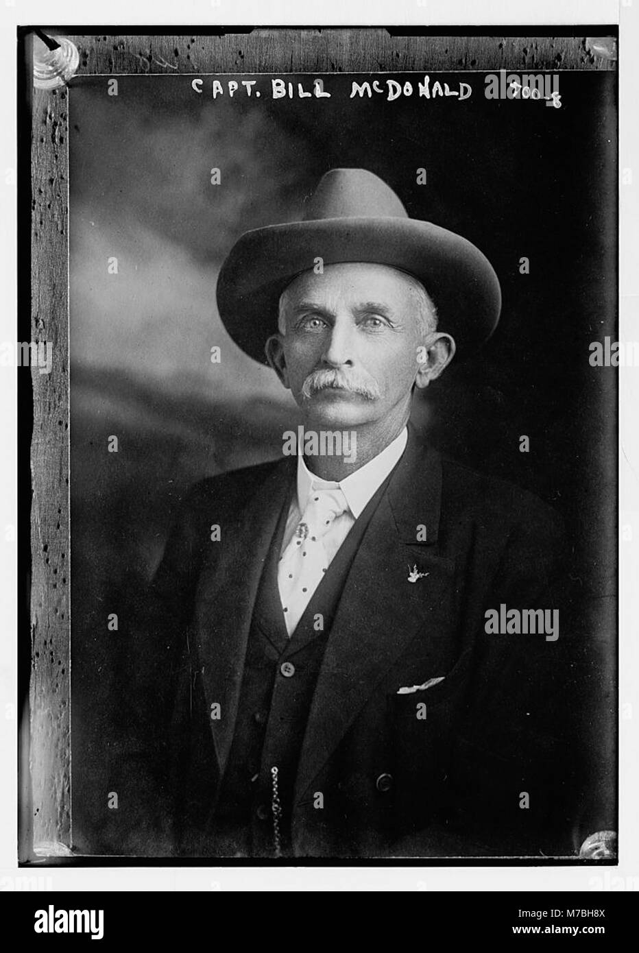 A portrait of Captain Bill McDonald, a noted figure in law enforcement ...