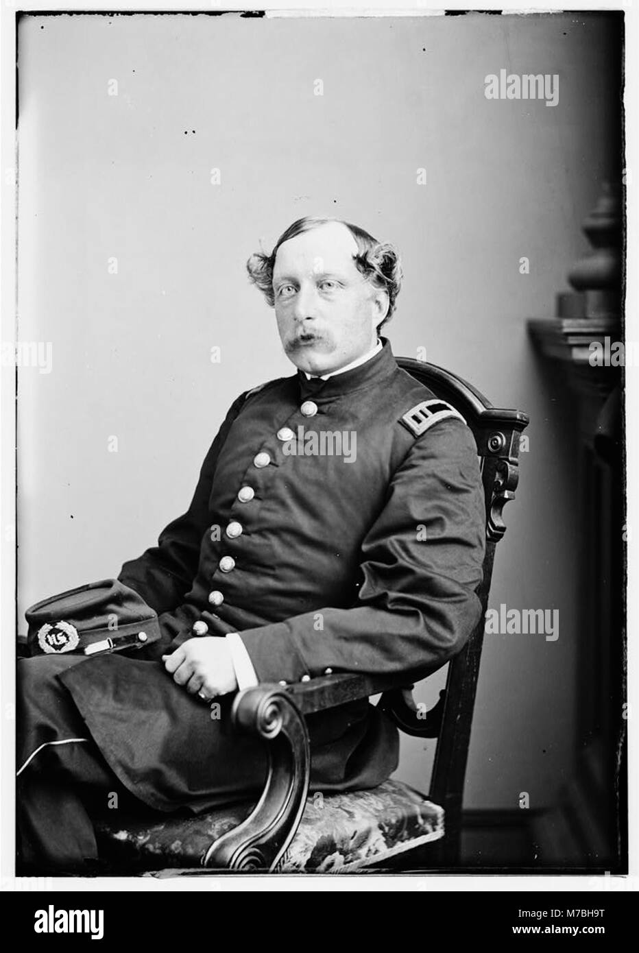Captain E.M. Neill, Assistant Adjutant General, is depicted in this ...