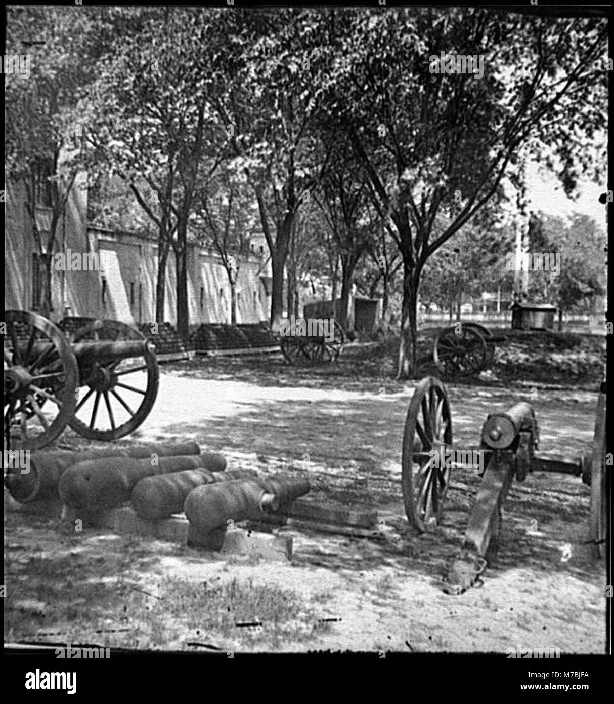 The image depicts Blakely guns and ammunition in the Arsenal yard of ...