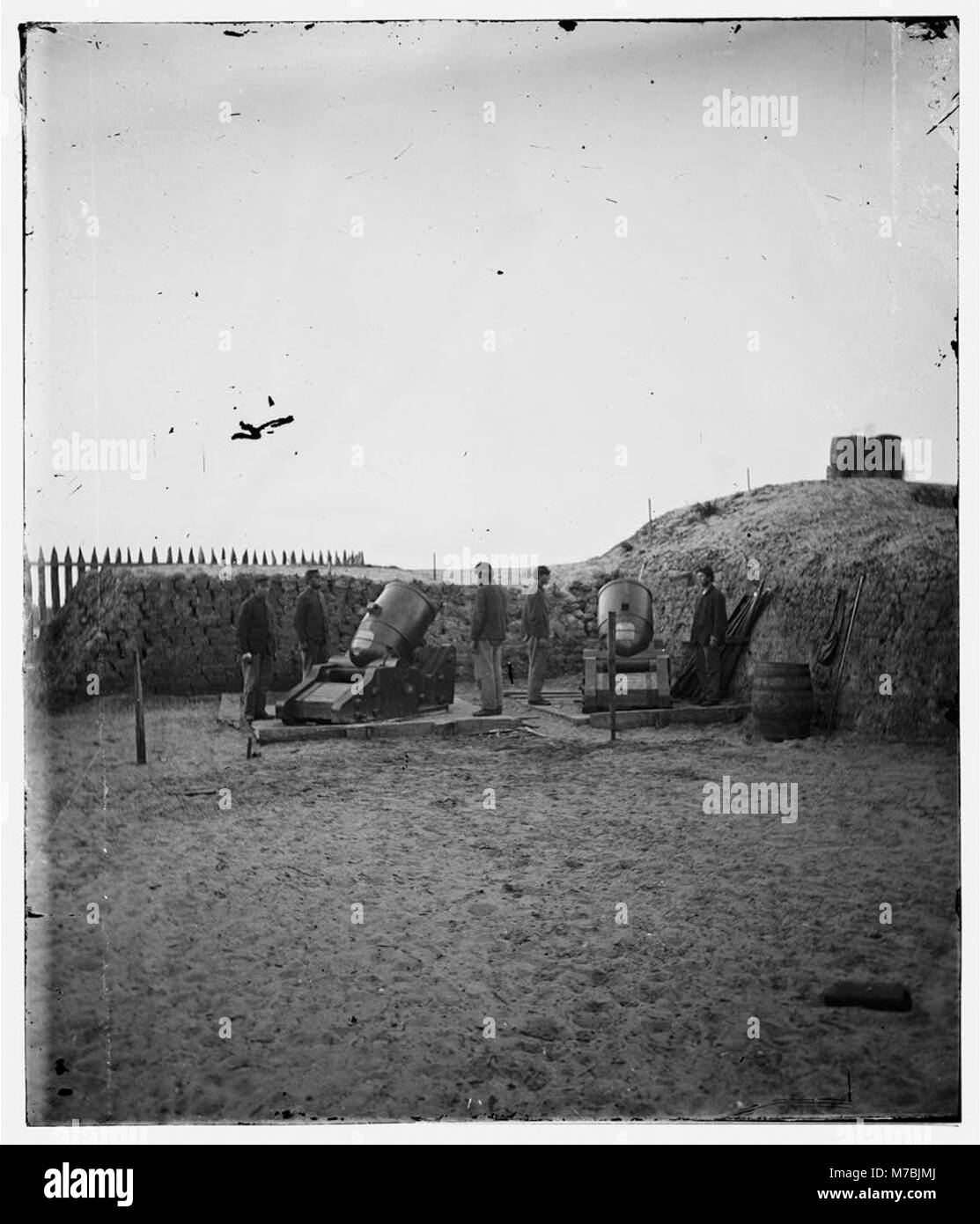 This historical photograph depicts a federal mortar battery on Morris ...