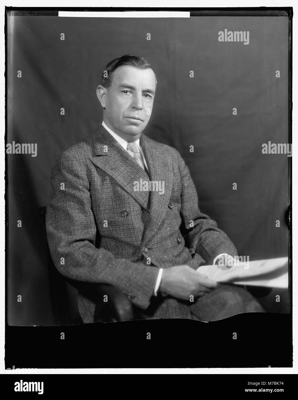A portrait of Dennis Chavez, a prominent political figure, captured in ...
