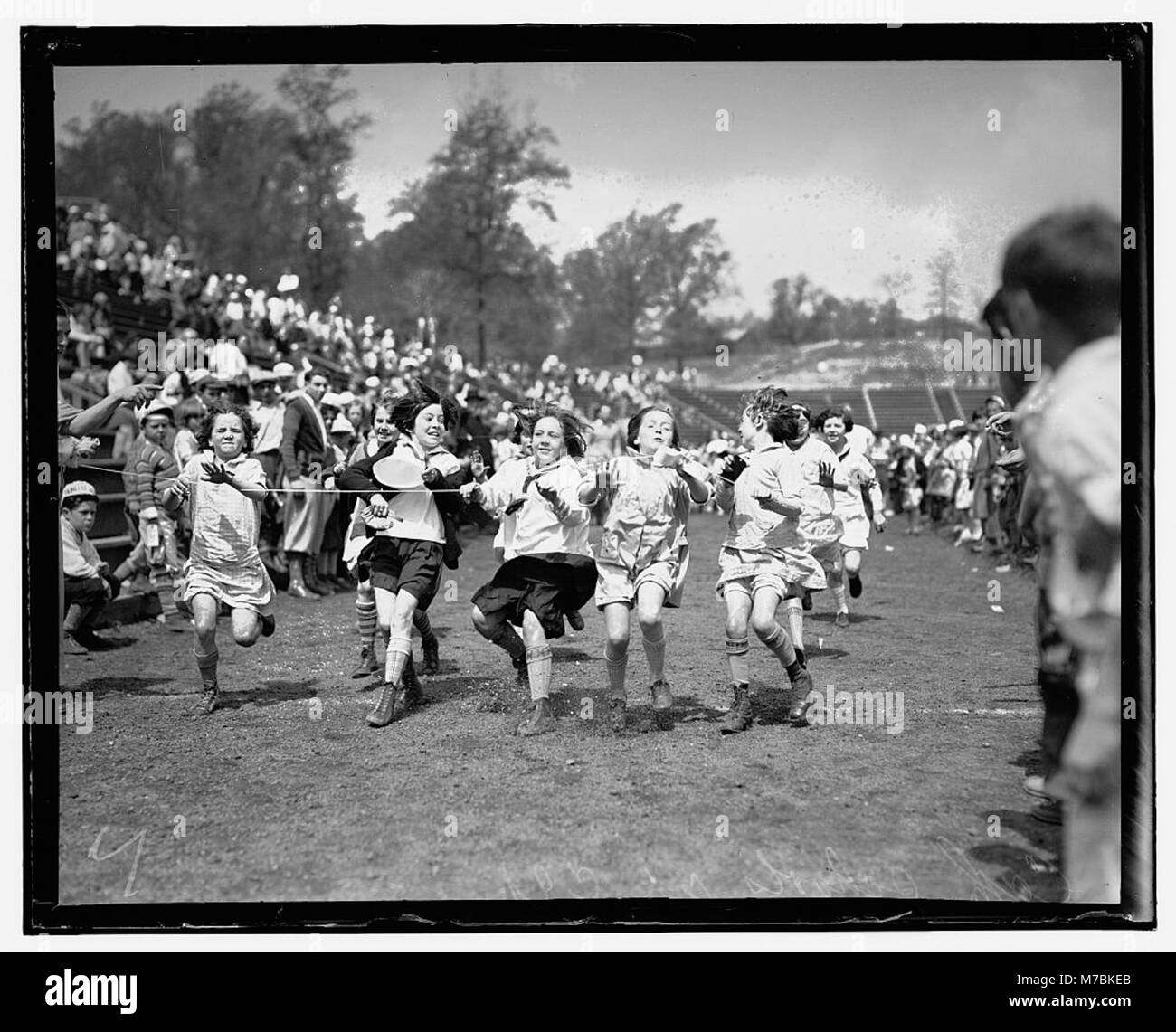 Children in race crossing finish line LCCN2016820394 Stock Photo - Alamy