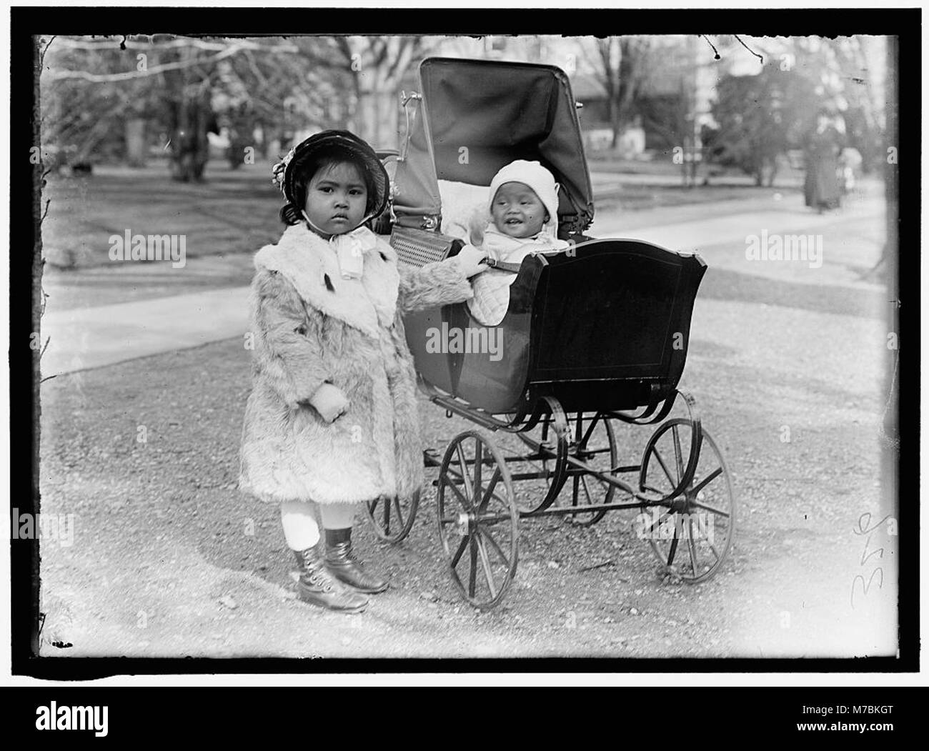 This photograph depicts a child, capturing a moment in their life ...