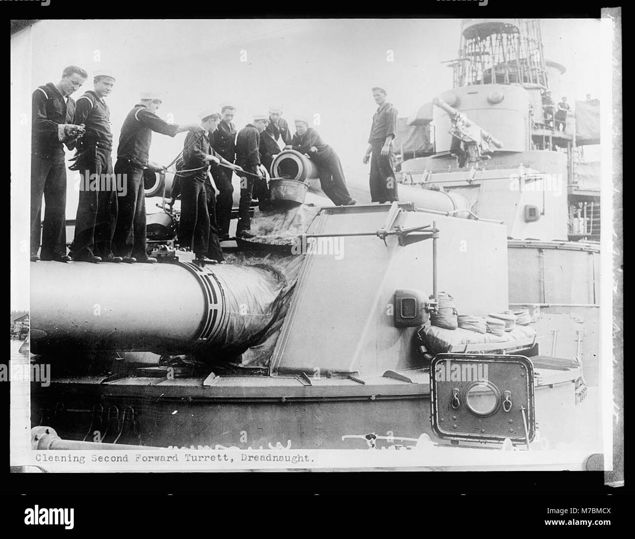 A photograph showing the cleaning process of the second forward turret ...