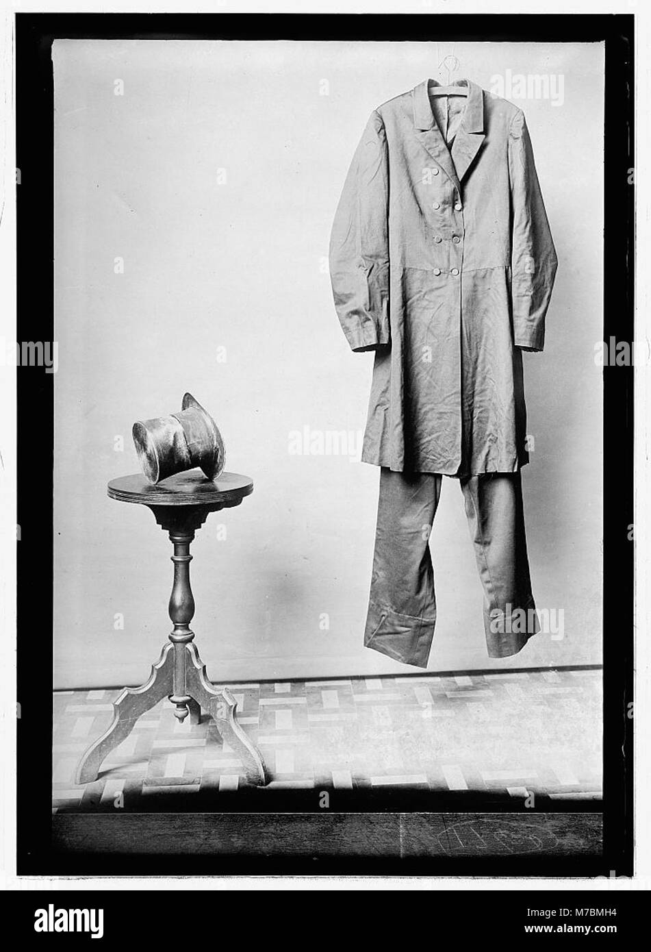 An image showing a historical example of clothing and hat styles ...