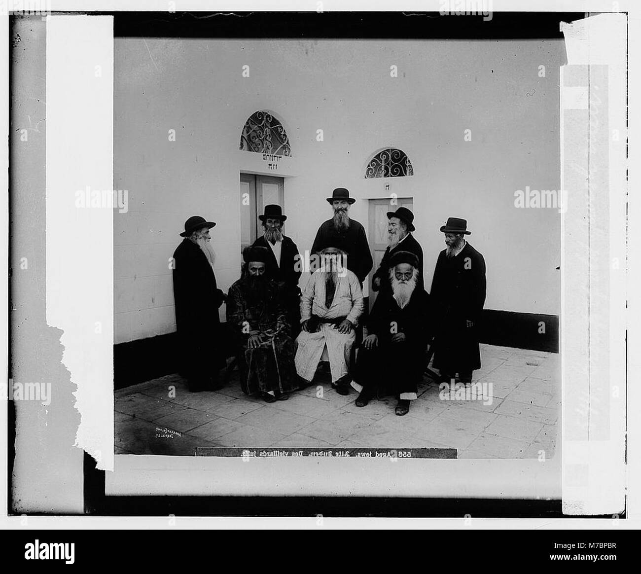 A group of elderly Jewish men is depicted in traditional costumes. This ...