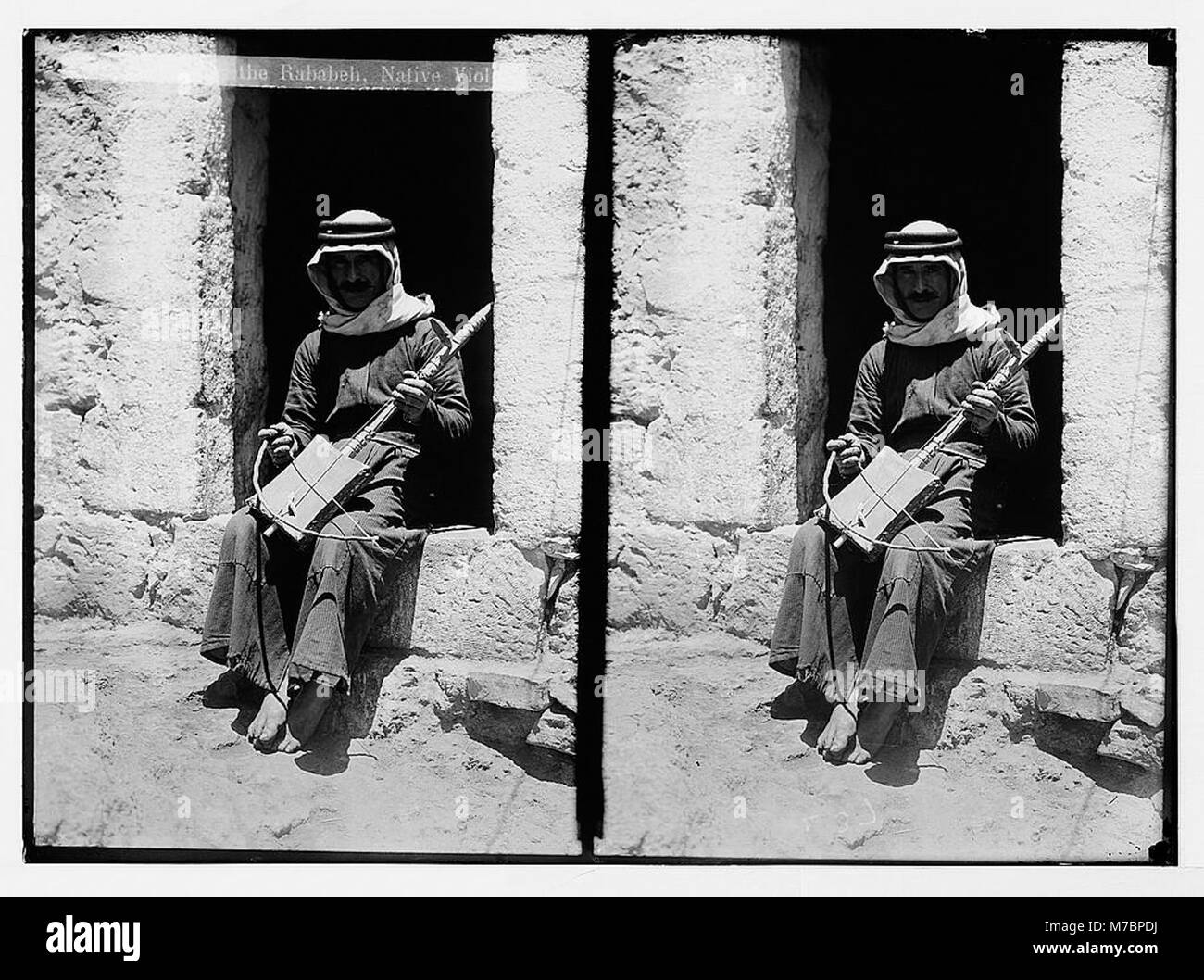 A traditional performance featuring characters in costumes playing the ...