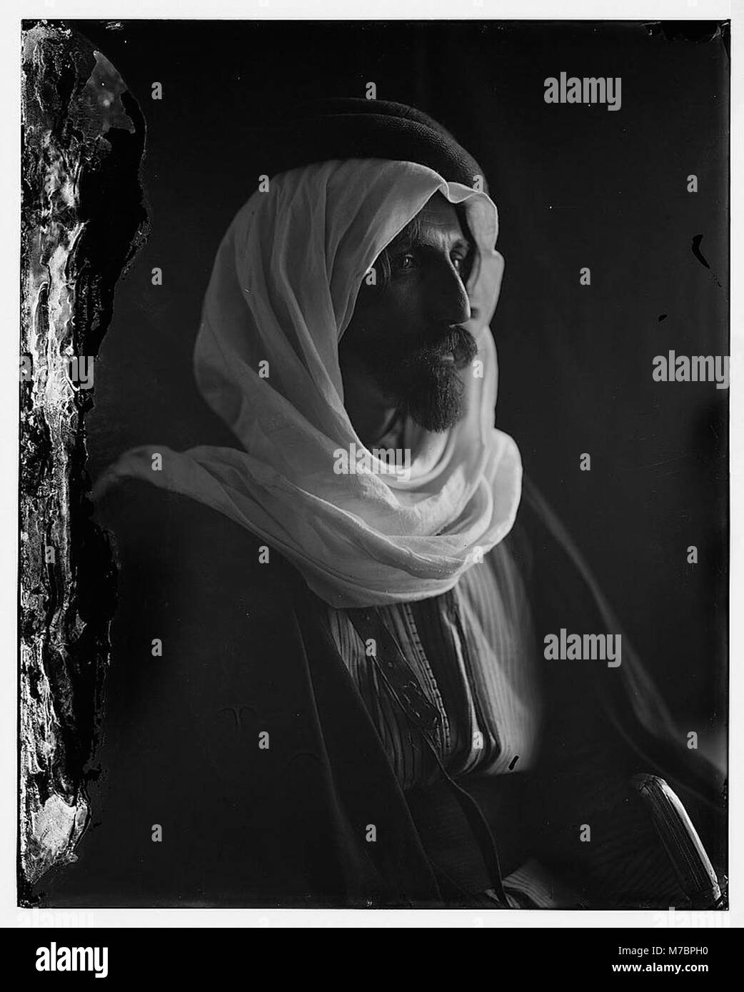 This image features a bust of a Bedouin, showcasing traditional costume ...