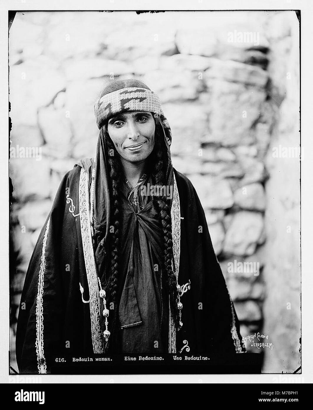 A bust of a Bedouin woman, capturing traditional attire and cultural ...