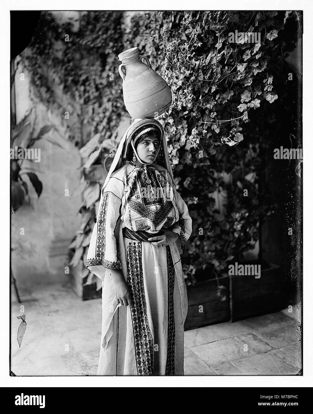 A photograph depicting girls from Ramallah in traditional costumes. The ...