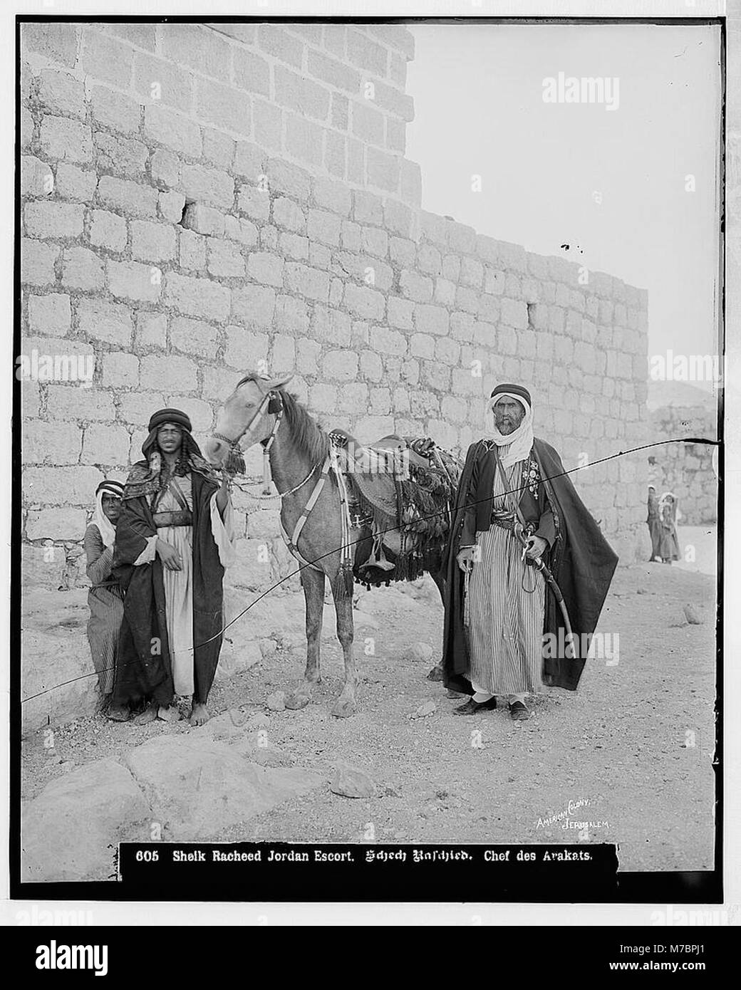 This image features a mounted village sheikh, dressed in traditional ...