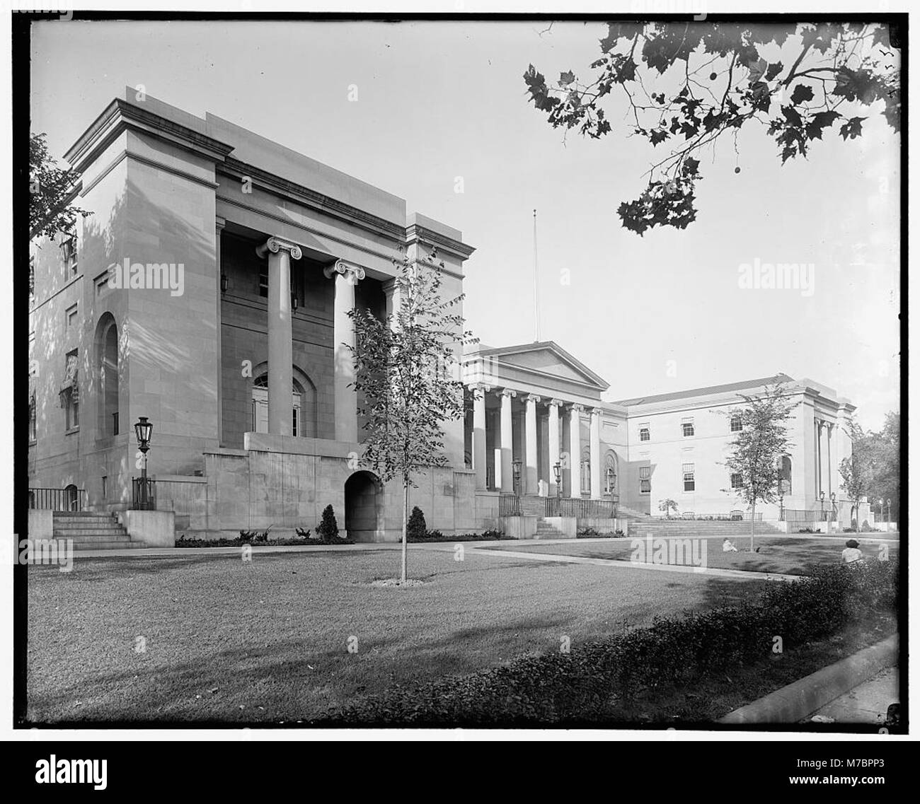 An exterior view of a courthouse, showcasing its architectural features ...
