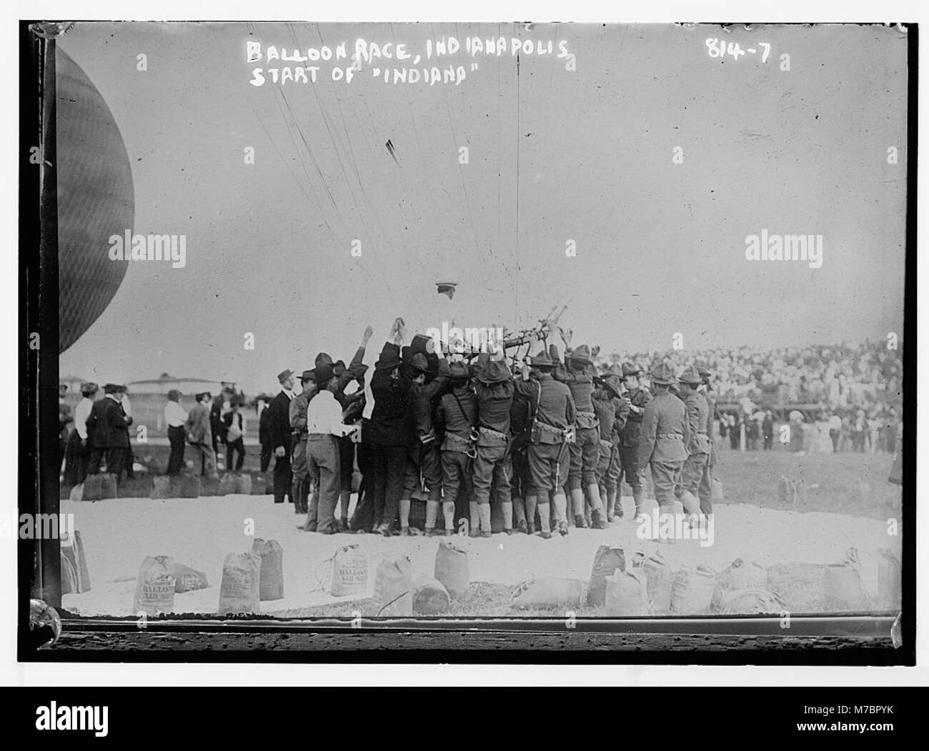 A historical photograph showing a crowd gathered at the start of the ...