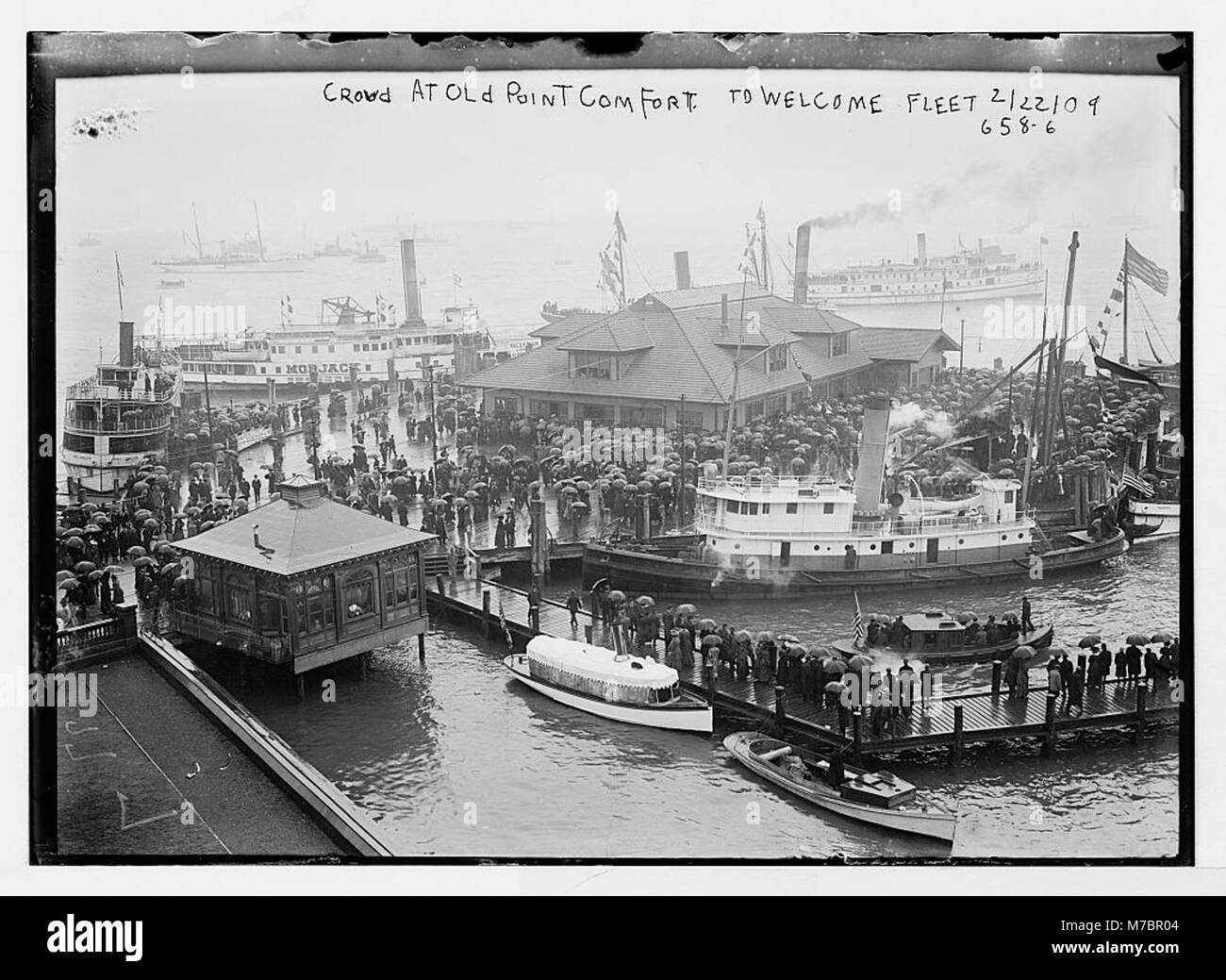 A crowd gathers at Old Point Comfort, eagerly awaiting the arrival of ...