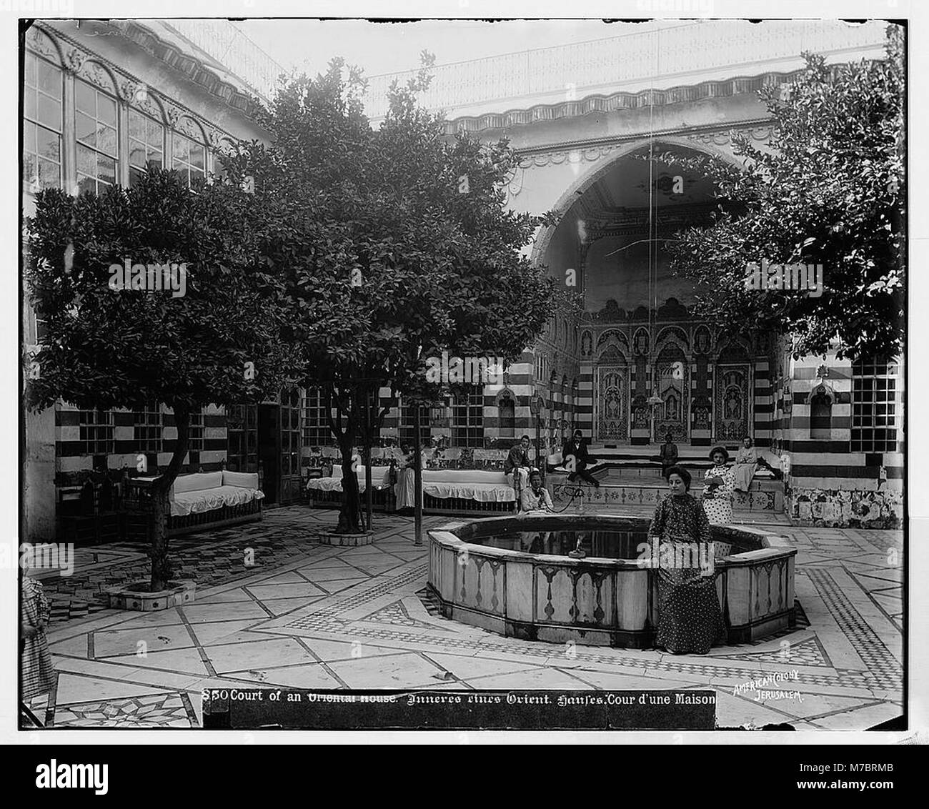 A photograph capturing the inner court of a traditional Damascus home ...