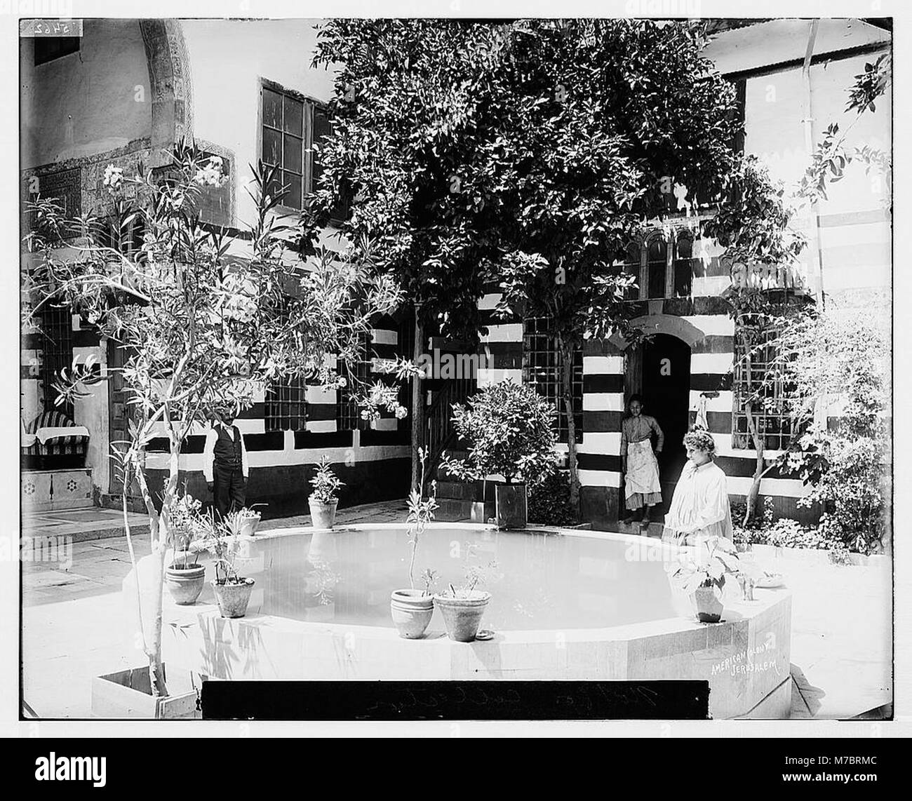 This image depicts the court of a traditional home in Damascus, Syria ...