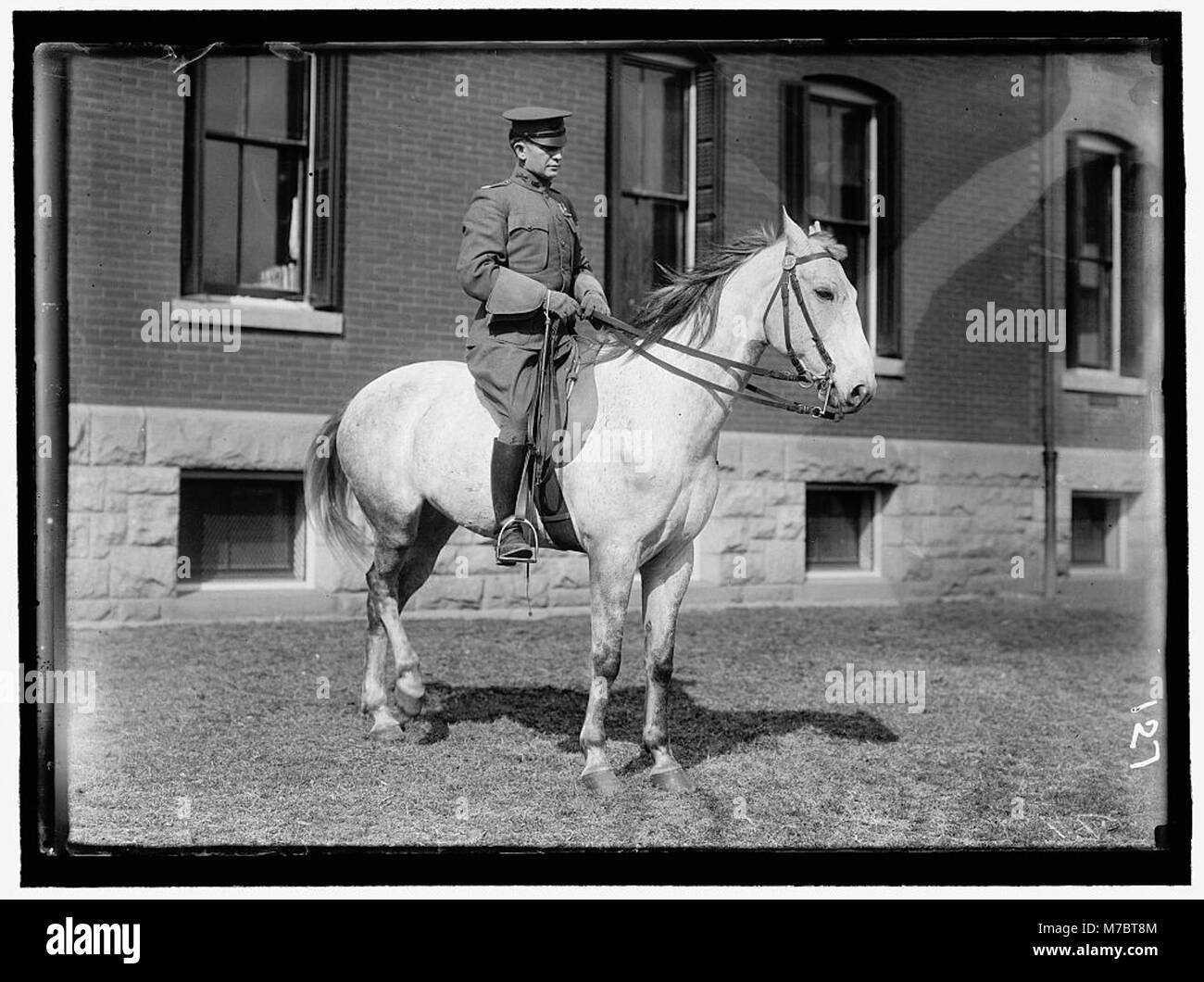 Captain Warren Dean of the 15th Cavalry, U.S. Army, is captured in this ...