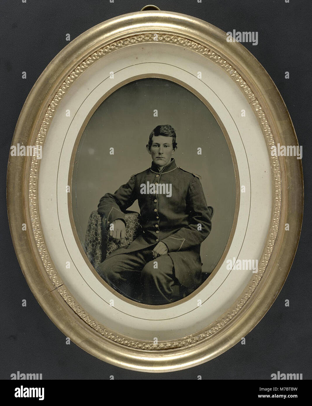 This image depicts an unidentified soldier in a Union private's uniform ...