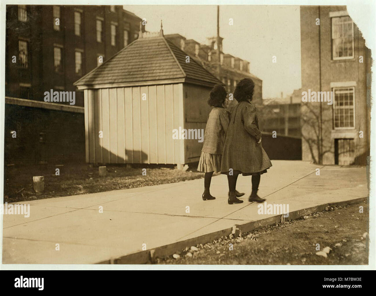 This 1909 photograph shows girls heading to work at Bates Manufacturing ...