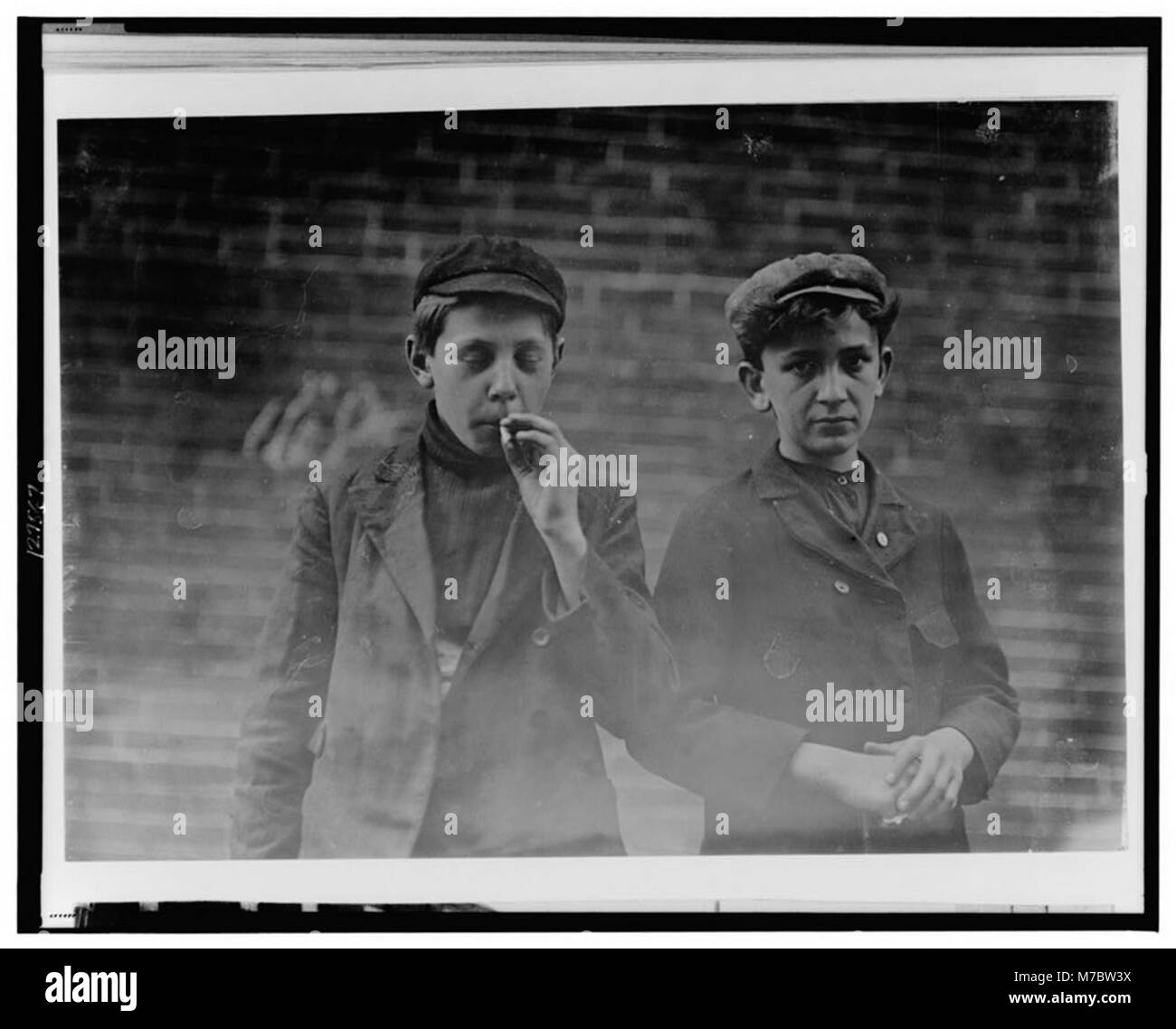 A photograph of two young workers at Bates Manufacturing Company in ...
