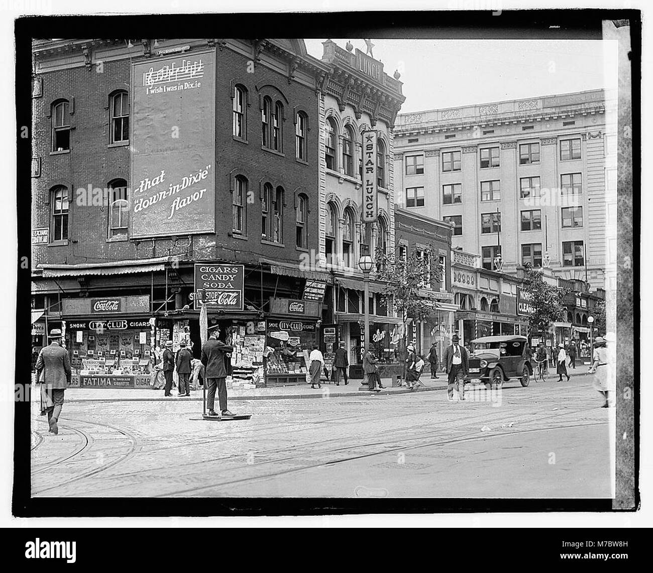 This image shows a scene at the intersection of 9th and S Streets in ...
