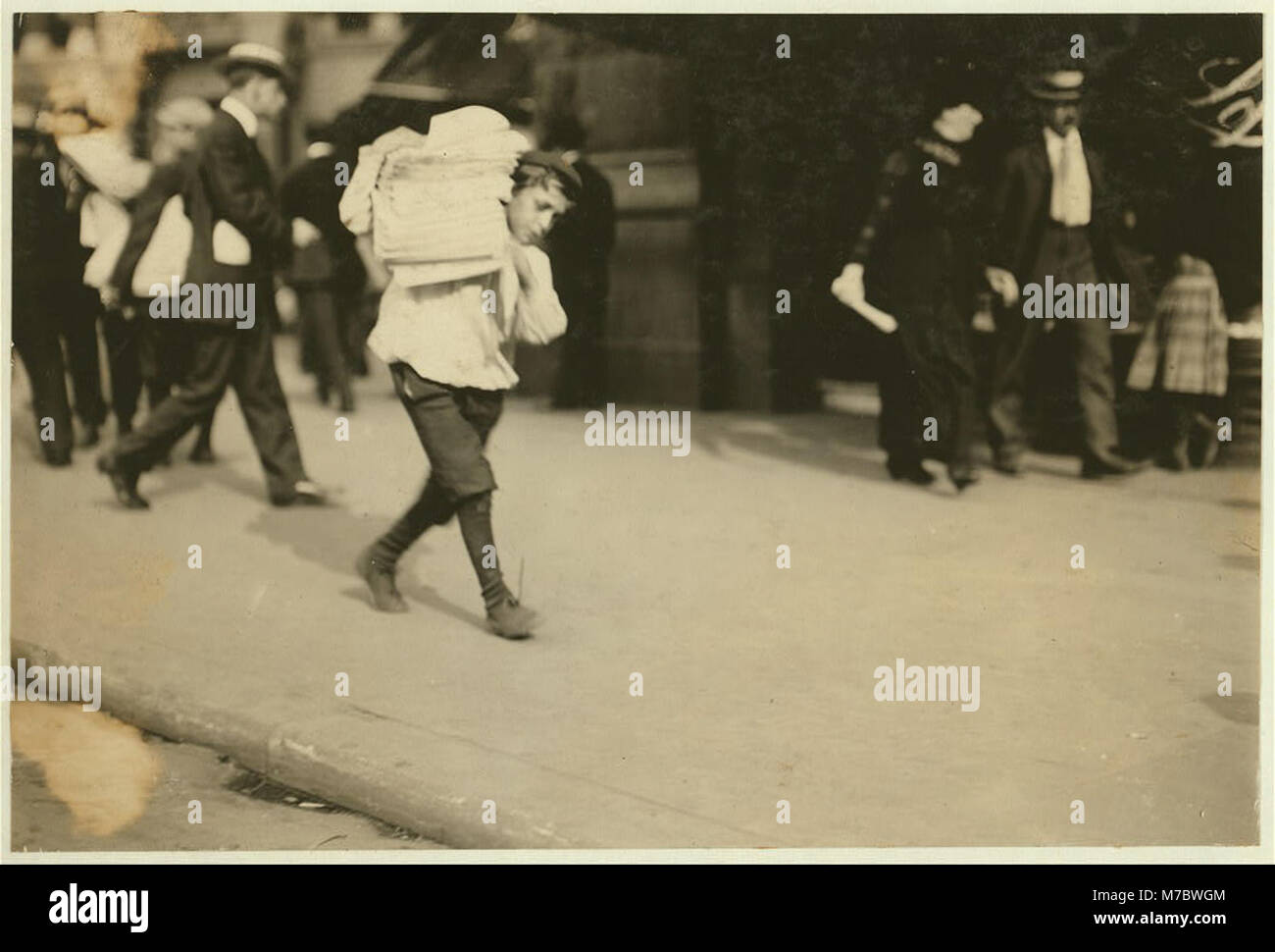 The image depicts a subject carrying a heavy load. It likely shows an ...
