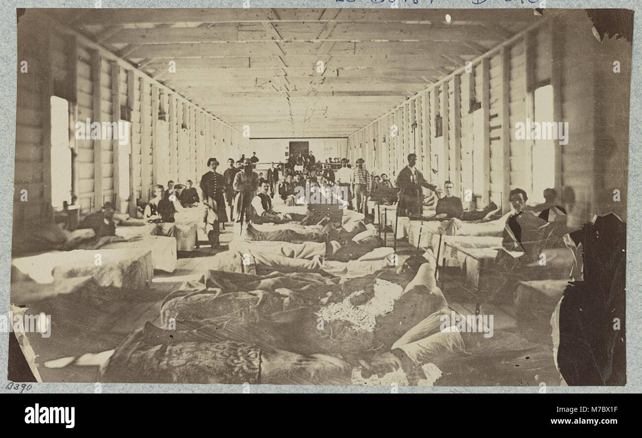 The photograph depicts a hospital ward at a convalescent camp near ...