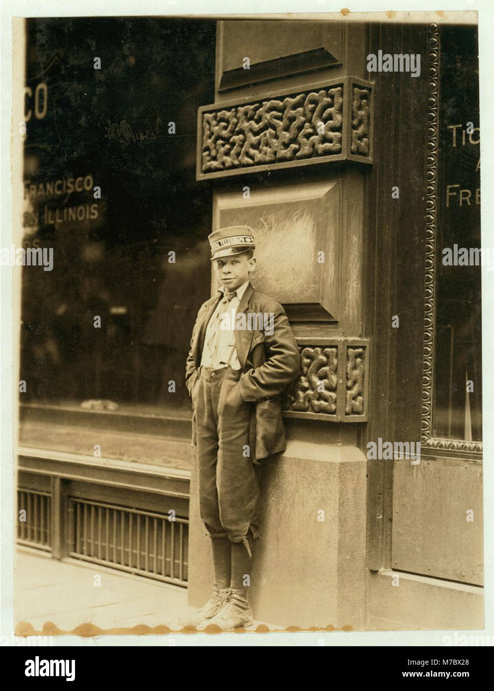 A young messenger from 1910, shown delivering a message or performing a ...