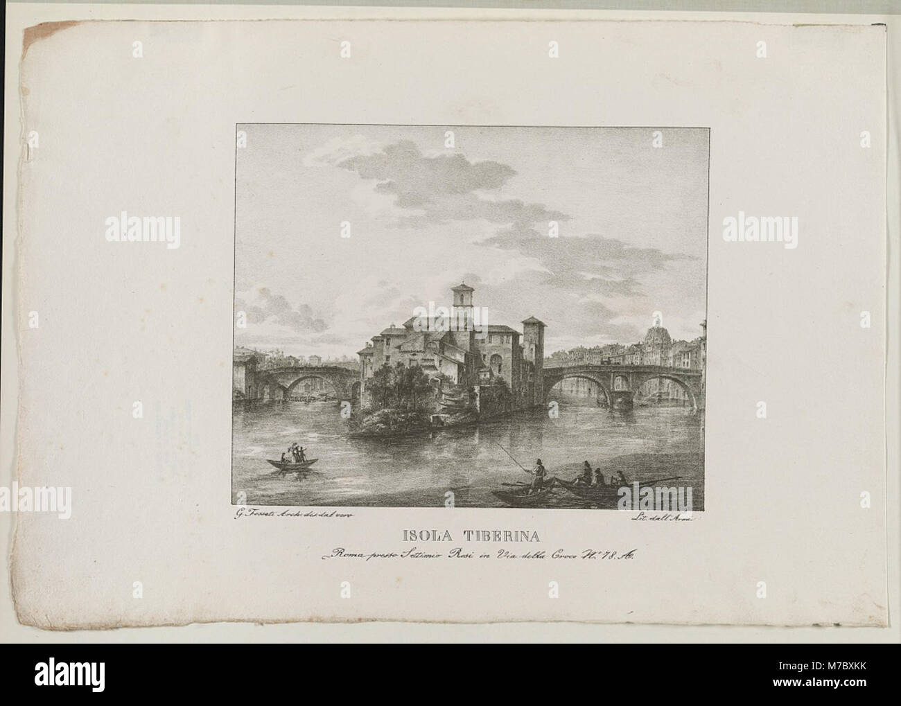 A scenic photograph of Isola Tiberina (Tiber Island), located in the ...